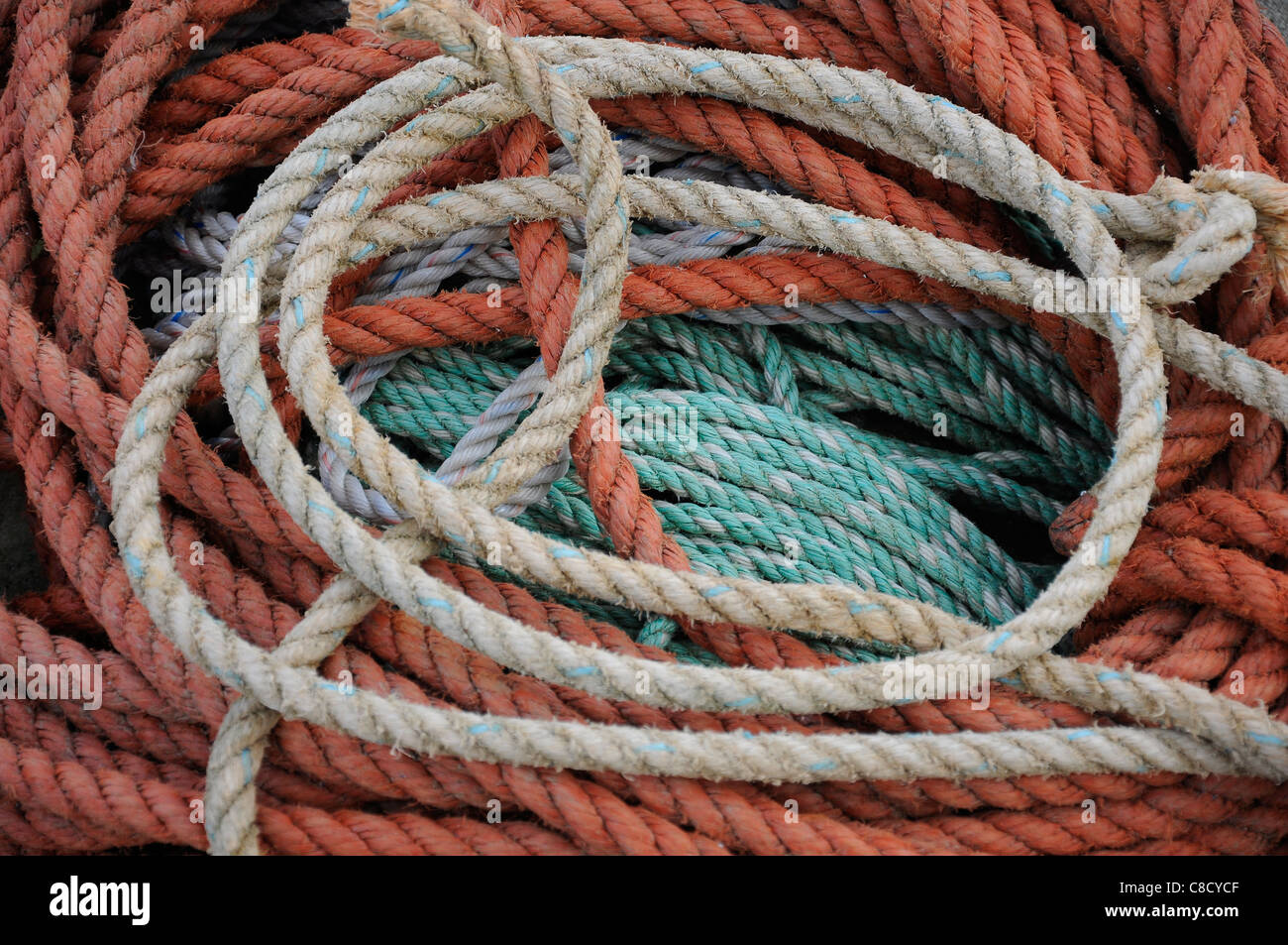 Fisherman's ropes coiled up for storage Stock Photo - Alamy