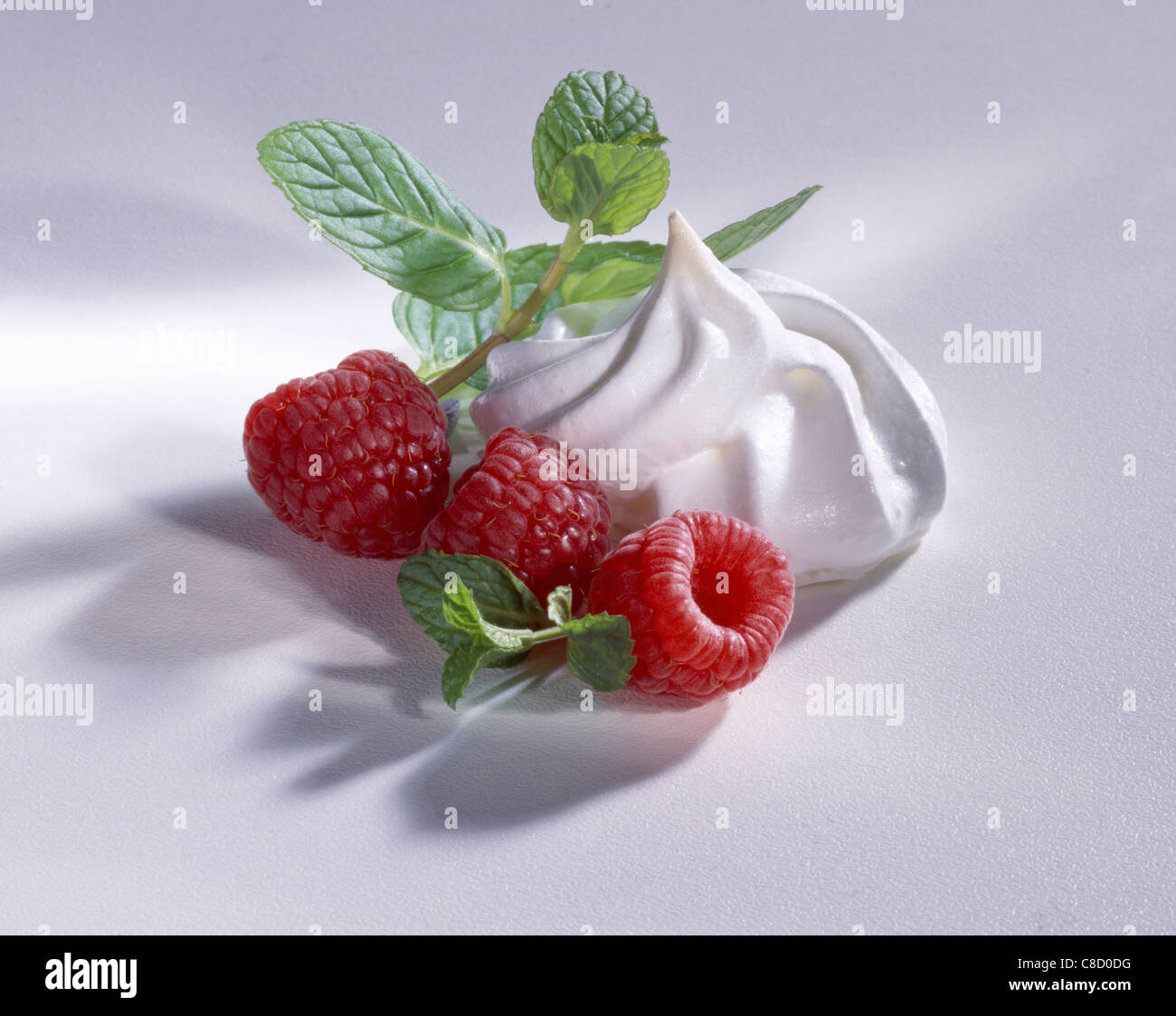meringue, fresh mint and raspberries Stock Photo - Alamy