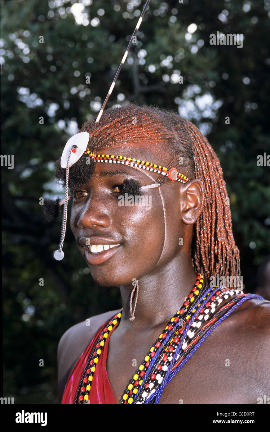 Lolgorian, Kenya. Siria Maasai Manyatta; moran with red ochre coloured ...