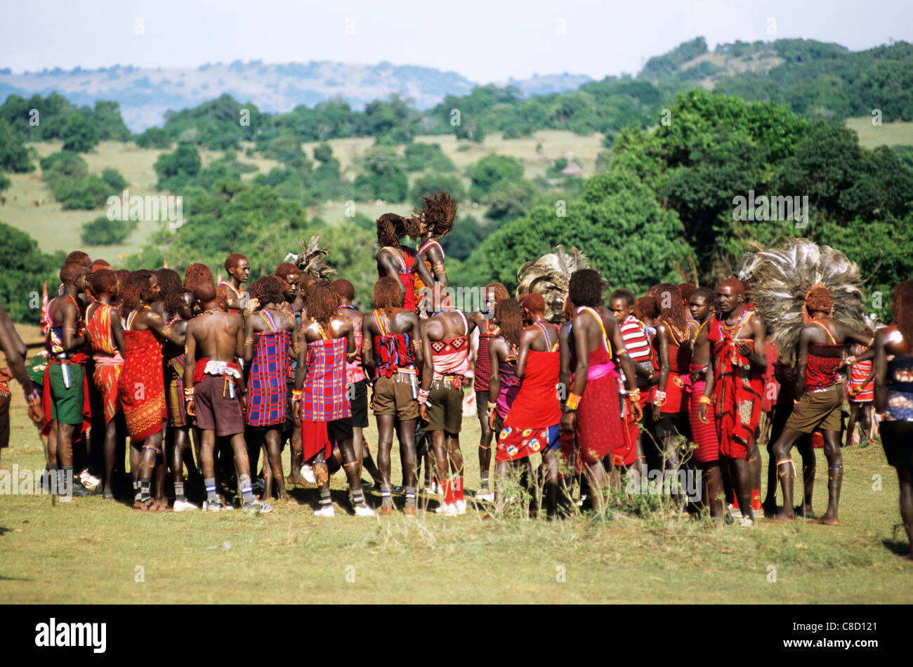 Lolgorian, Kenya. Siria Maasai Manyatta; group of moran doing their ...
