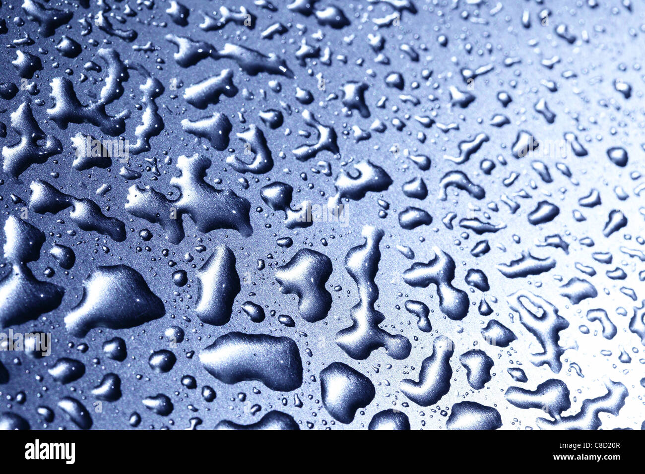 Colorful liquid metal water drops hi-res stock photography and images ...