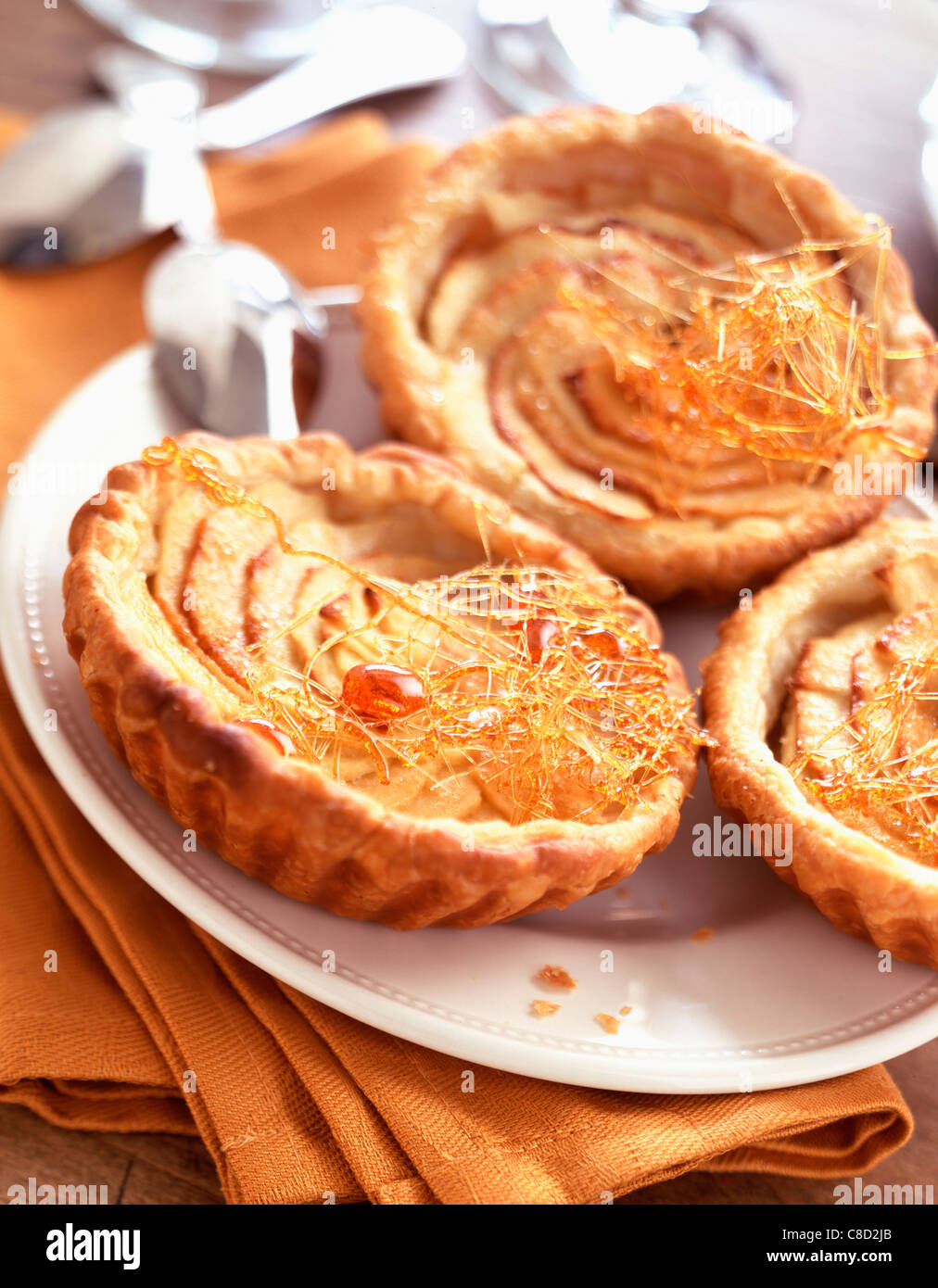 Apple and caramel thread tarts Stock Photo - Alamy