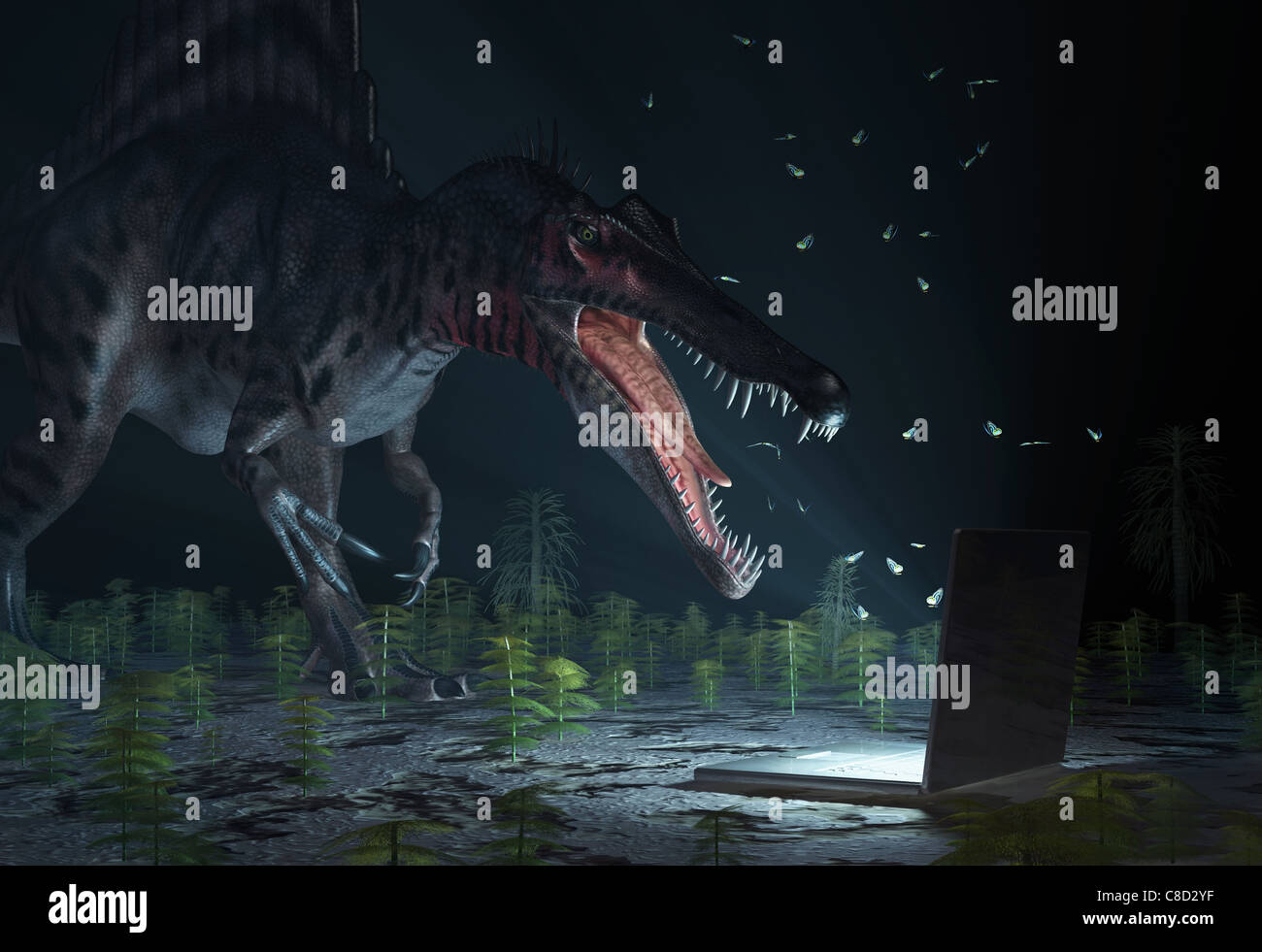 dinosaur looking on computer Stock Photo - Alamy