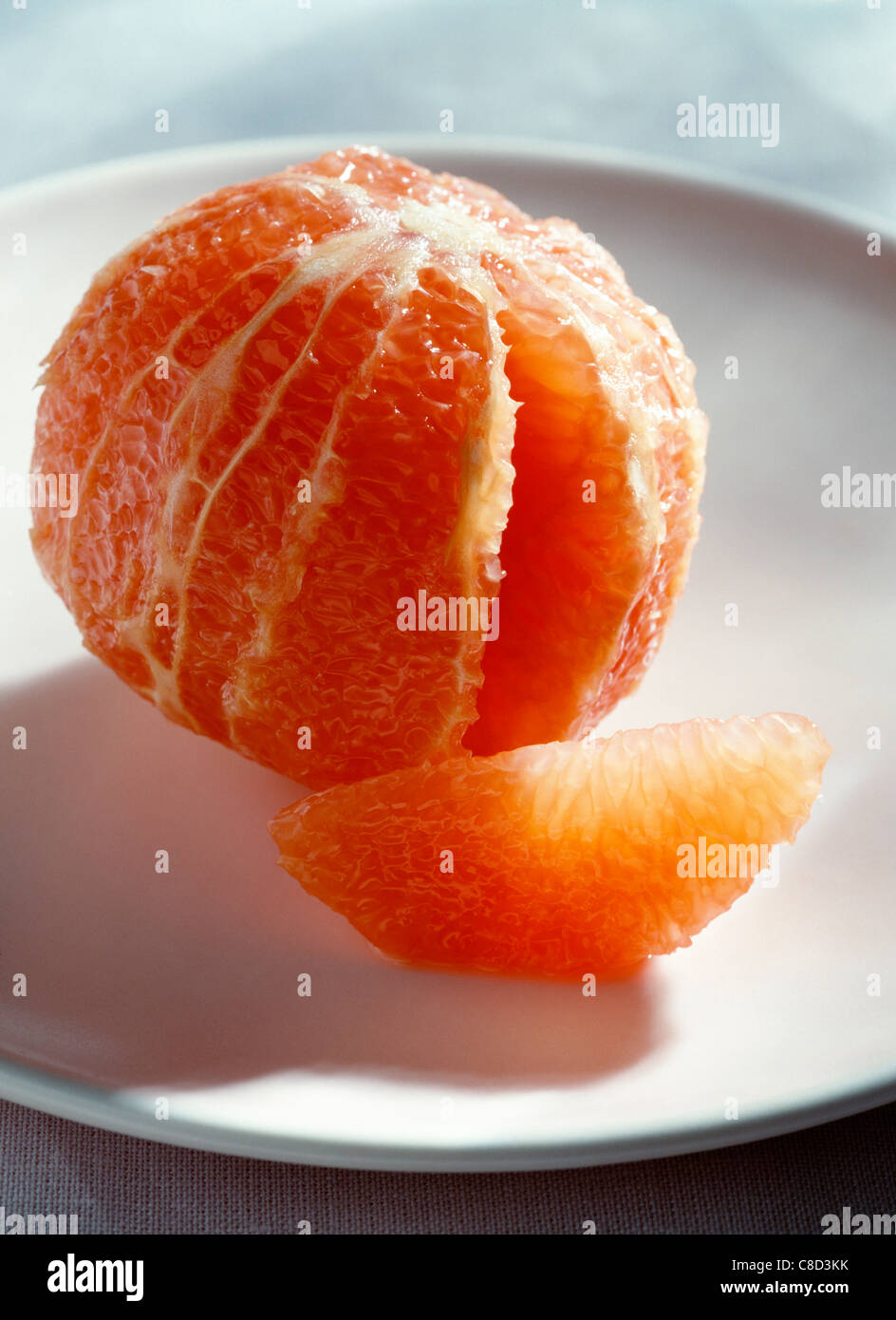 Grapefruit peeled to the flesh Stock Photo - Alamy
