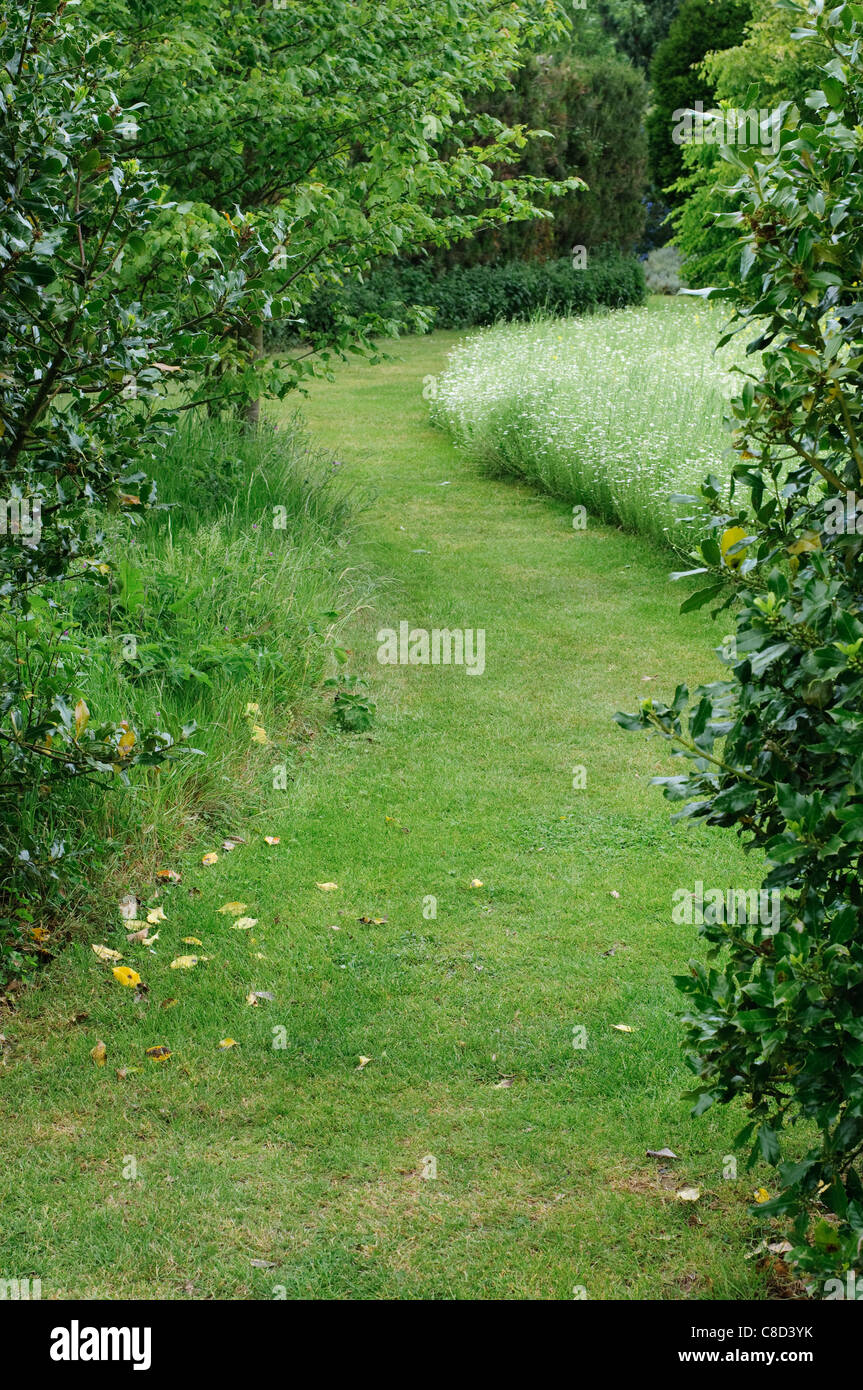 Garden path in English garden Stock Photo - Alamy