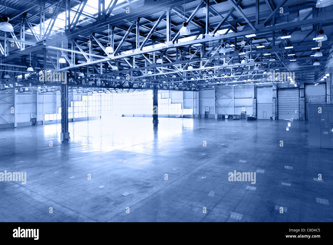 Huge storehouse toned in the blue color Stock Photo - Alamy