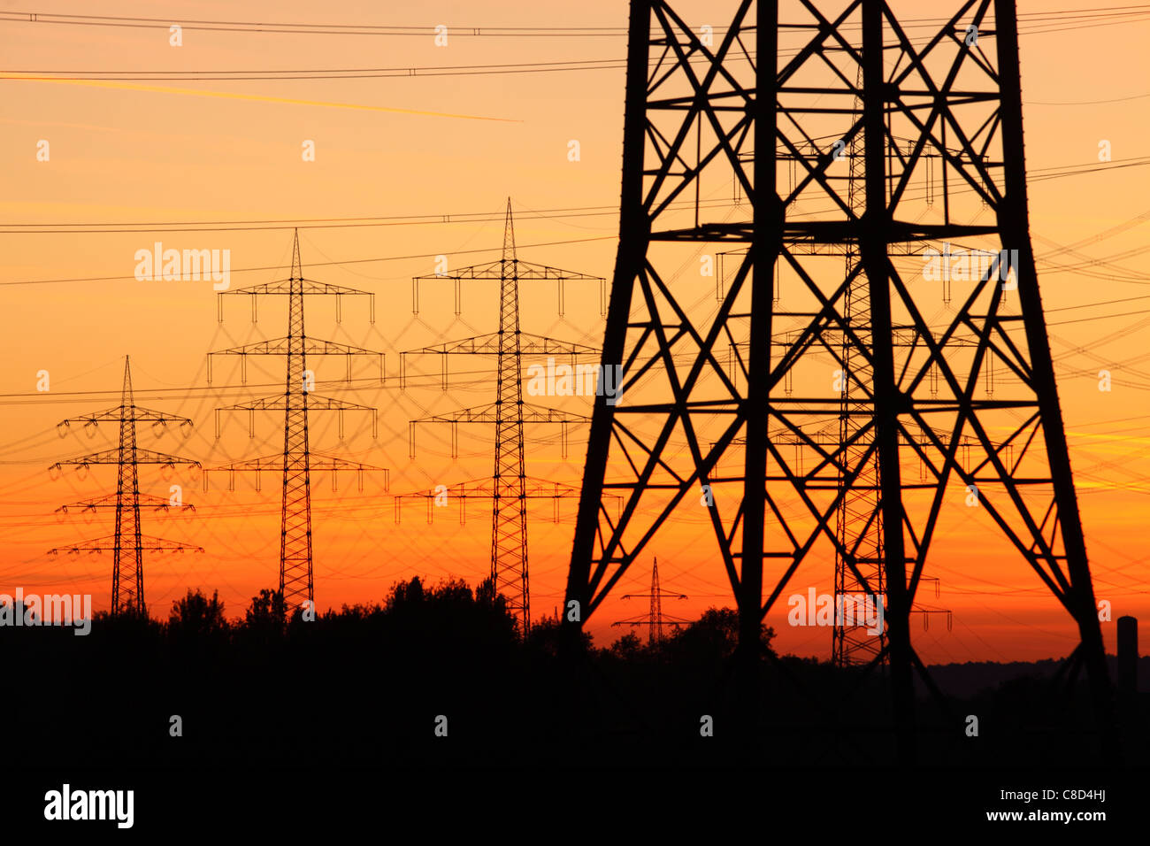 HIgh voltage power lines, at sunset Stock Photo - Alamy