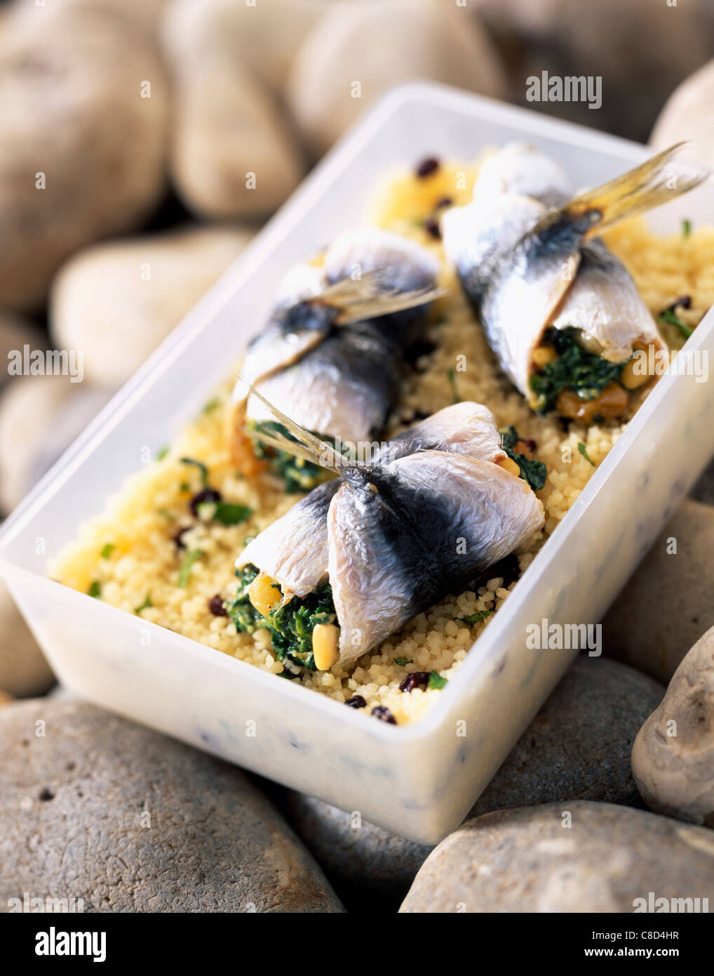 Sardines stuffed with spicy couscous Stock Photo - Alamy