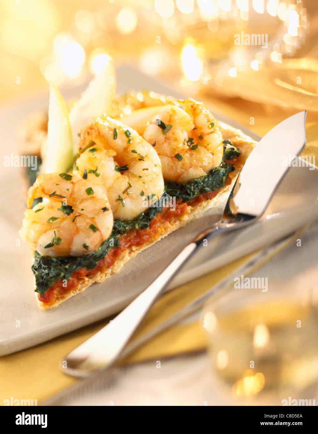 slice of prawn, spinach and tomato tart Stock Photo - Alamy