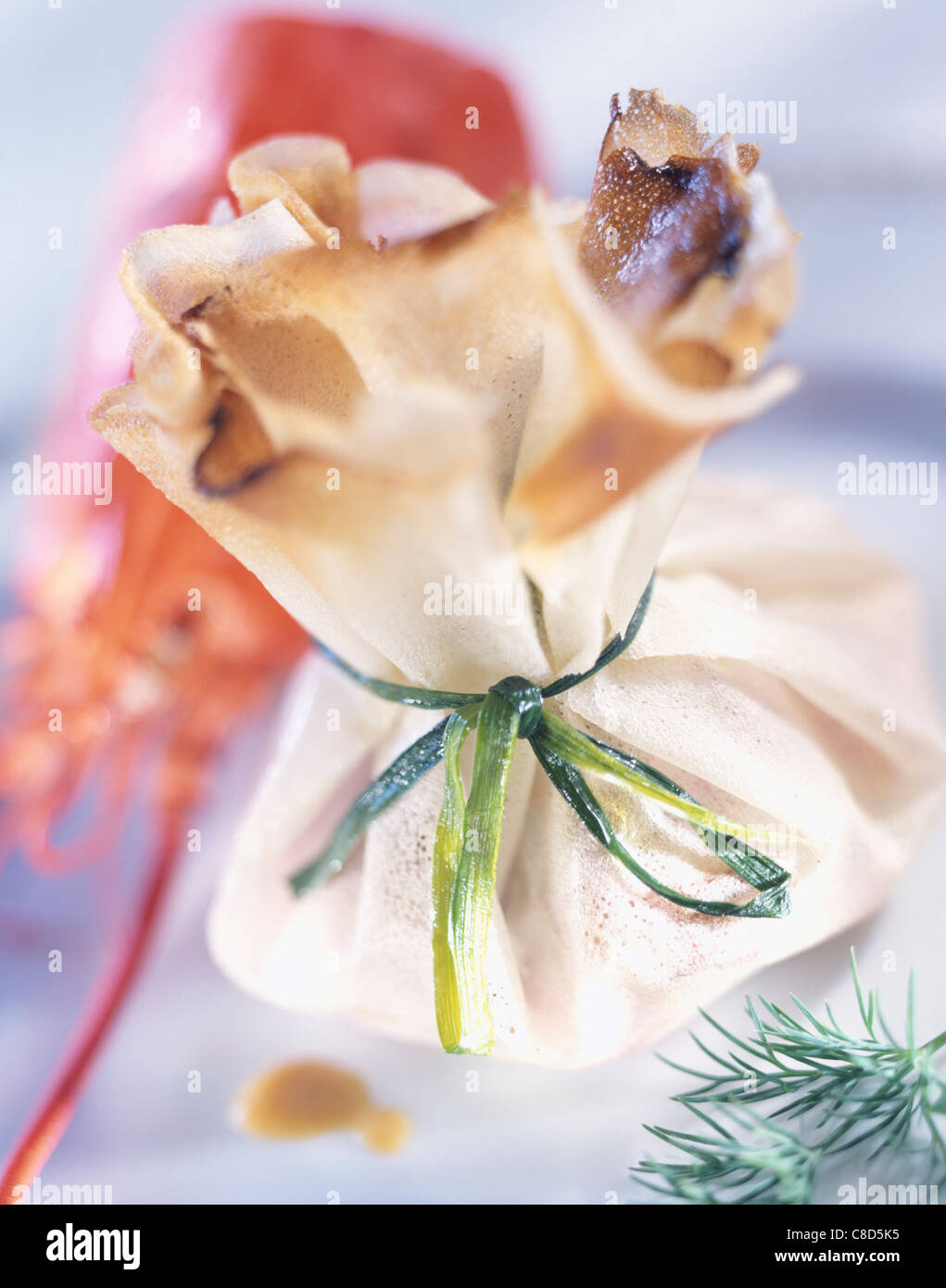 Spiny lobster filo pastry purse Stock Photo - Alamy