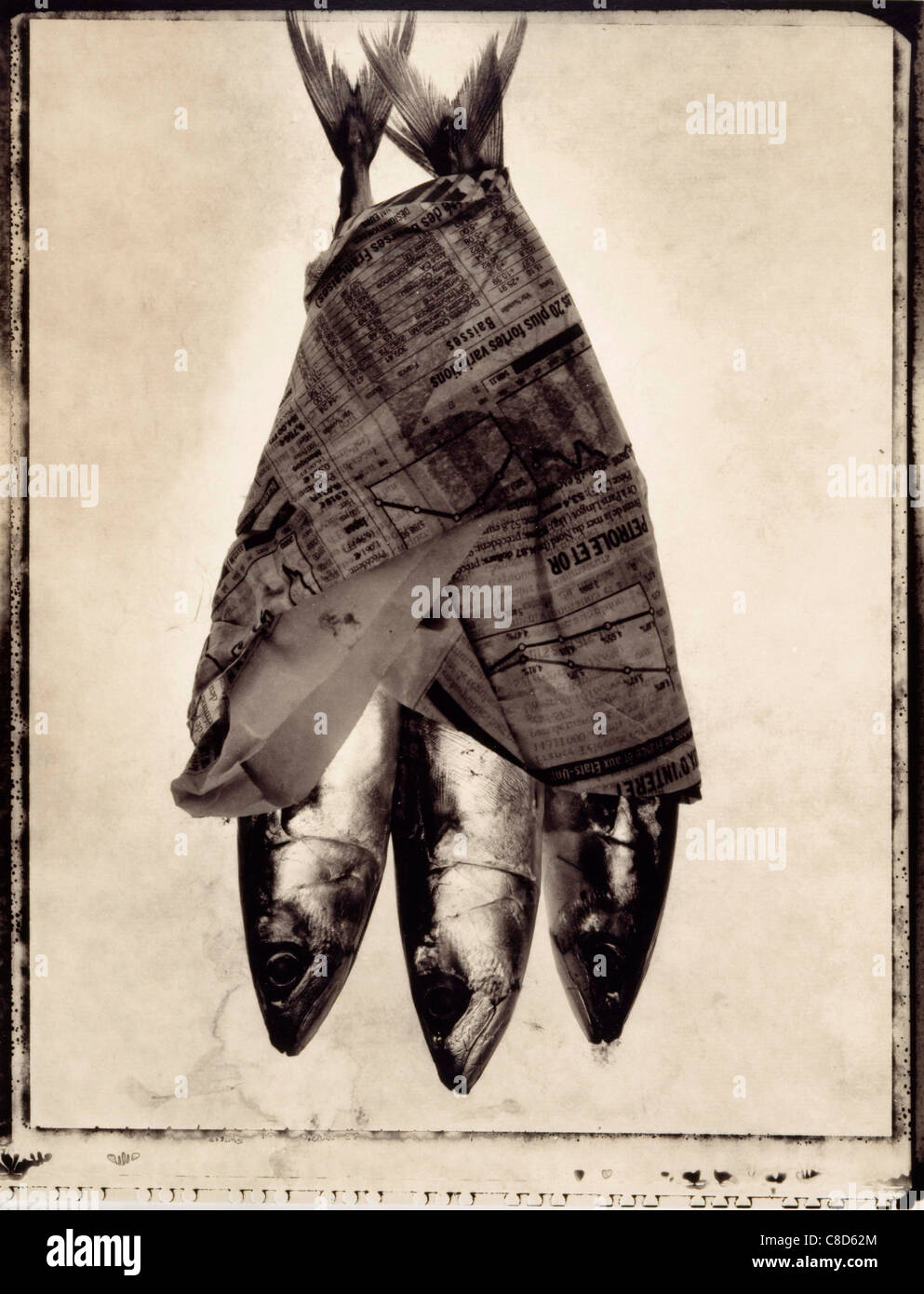Fish wrapped newspaper hi-res stock photography and images - Alamy