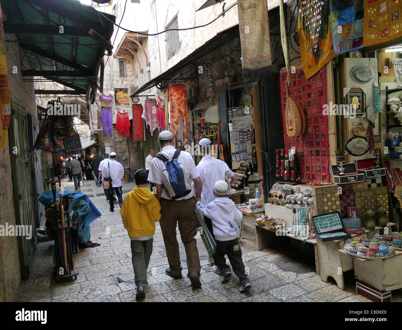 Jerusalem, Jewish family walking through Arab market in Old City Stock ...