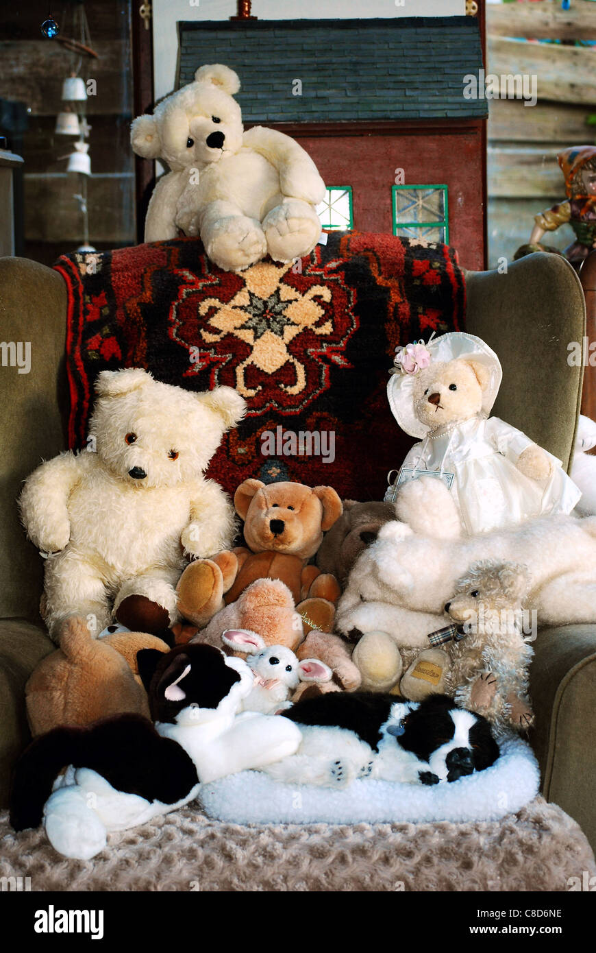 teddies on a chair Stock Photo - Alamy