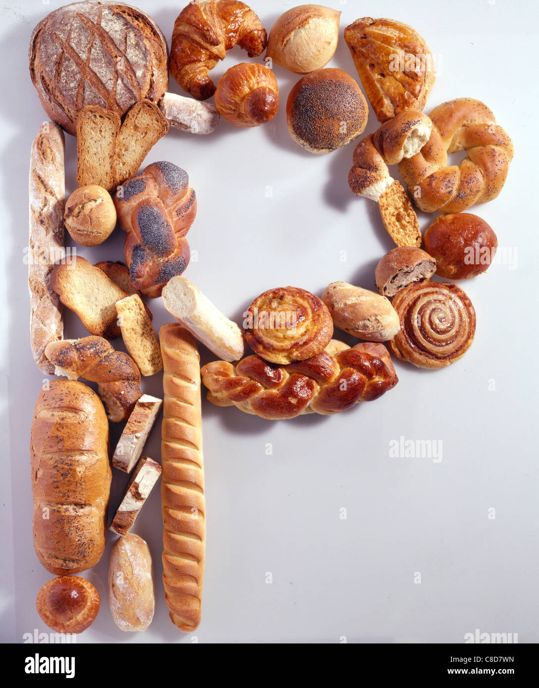 Selection of breads arranged in letter P shape Stock Photo - Alamy