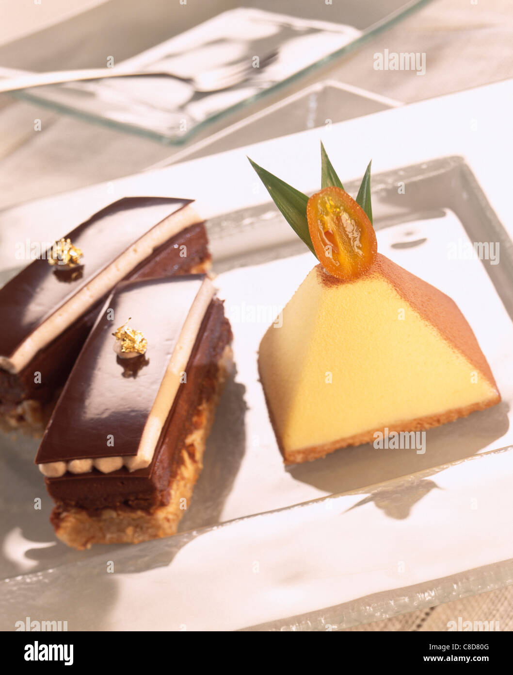 Hazelnut, chocolate and biscuit dessert plus pyramid dessert Stock ...