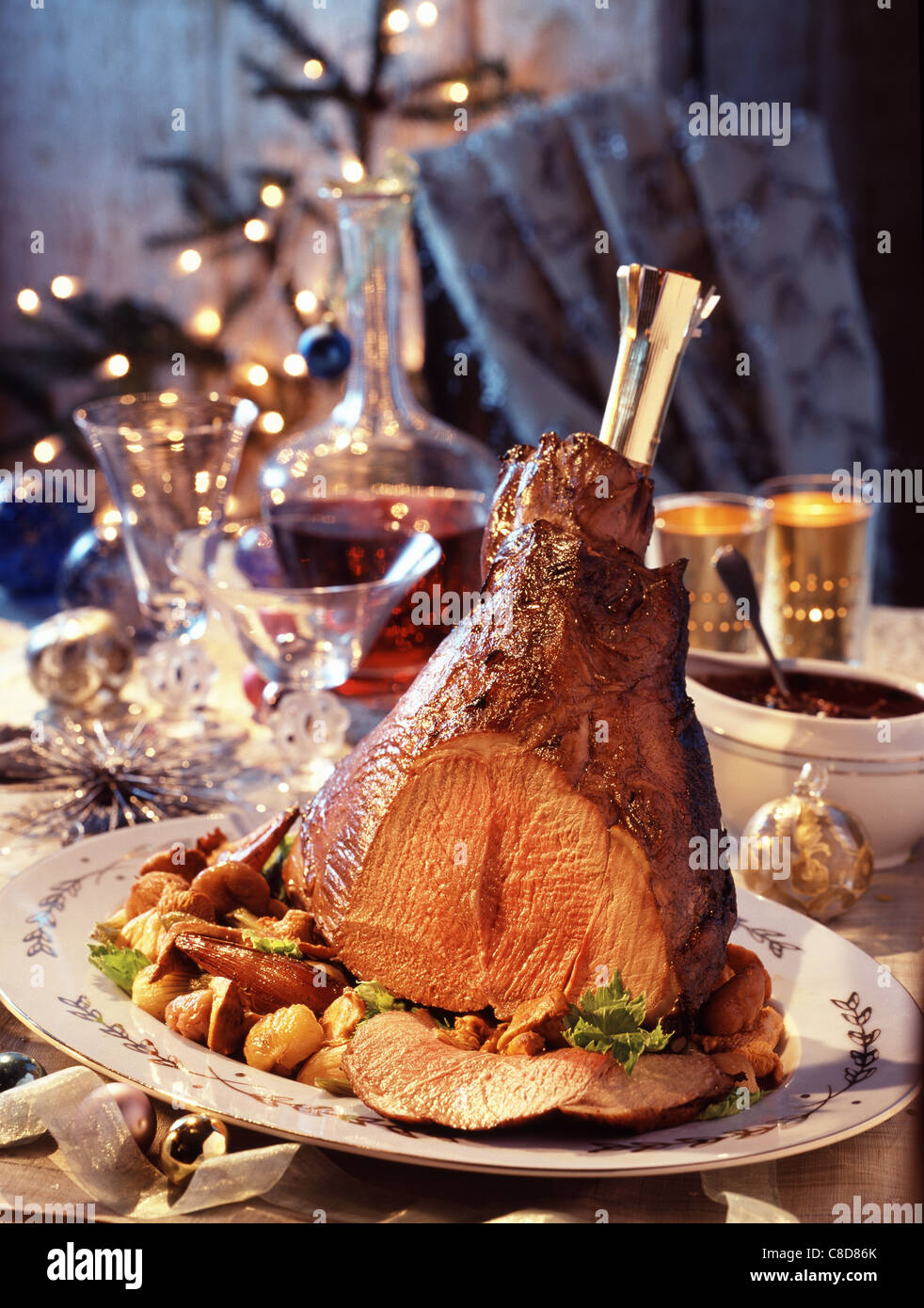 roast haunch ot baby boar with pan-fried christmas vegetables Stock ...