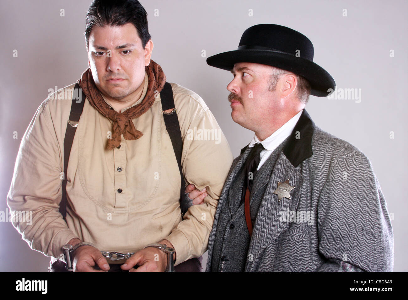 A cowboy under arrest Stock Photo - Alamy