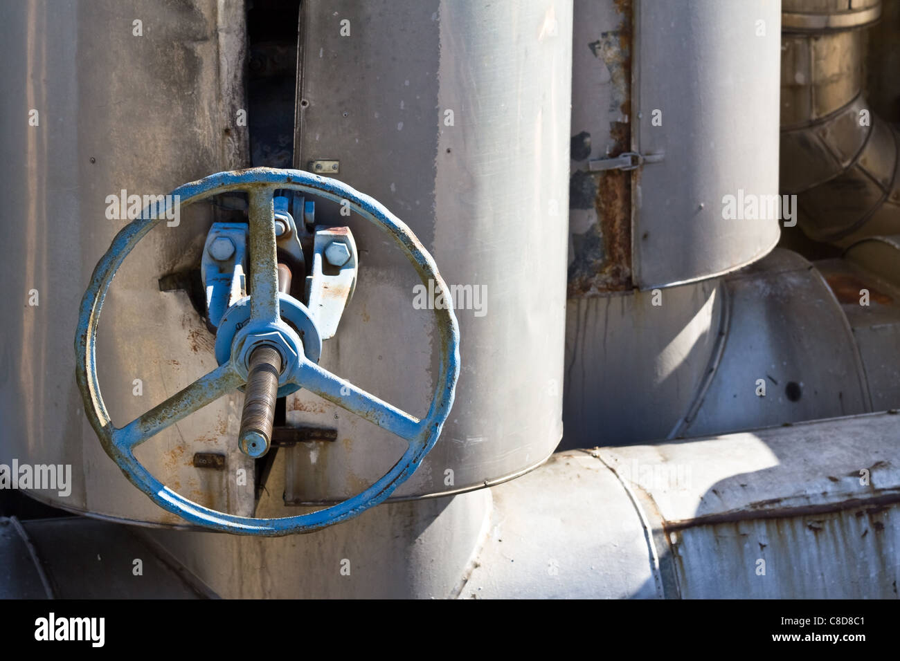 An aged industrial valve in a refinery close to Vienna Stock Photo - Alamy