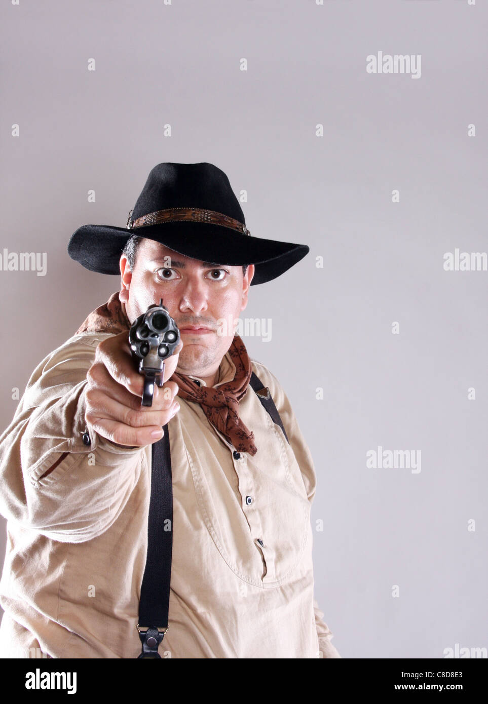 Cowboy Gunslinger Pointing Gun High Resolution Stock Photography and ...