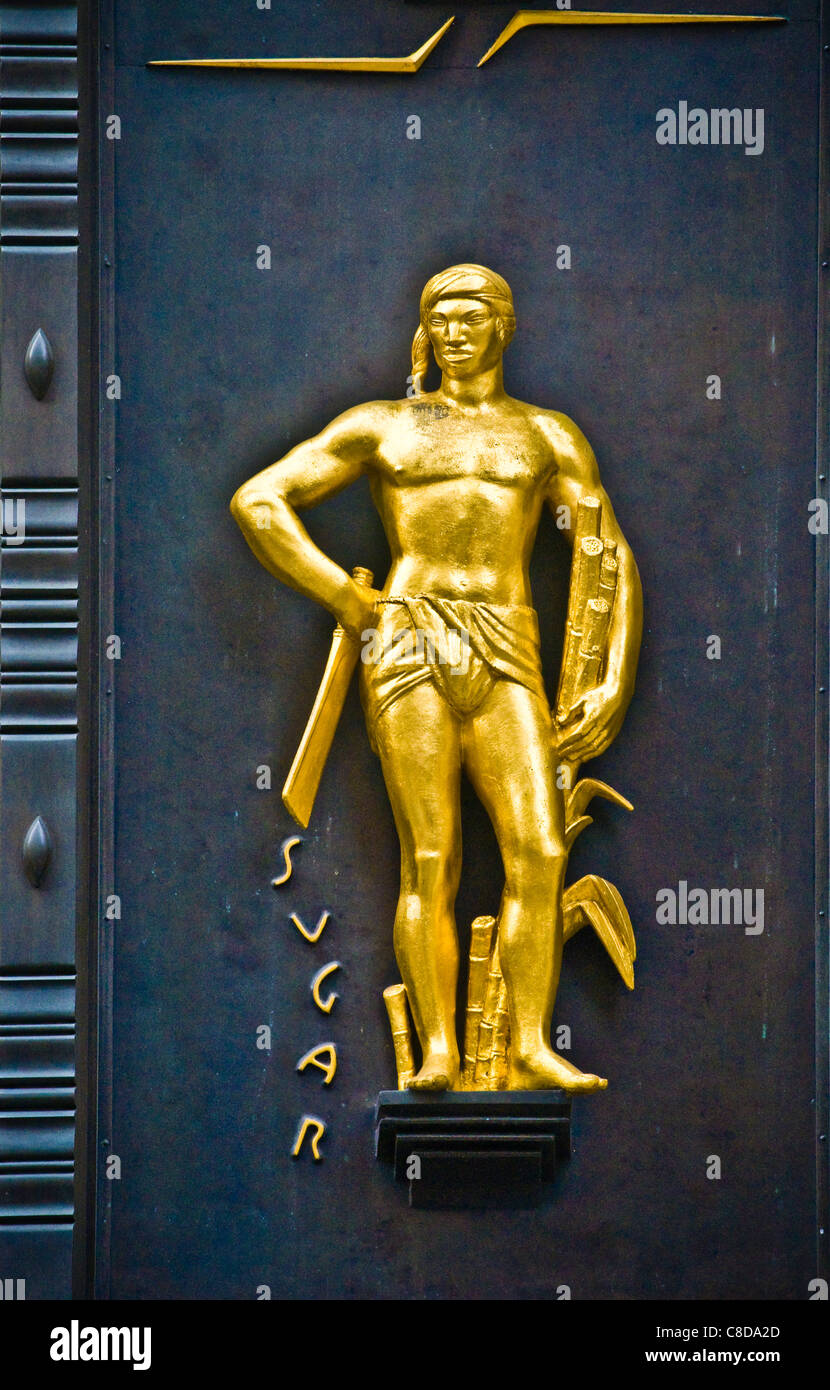 Gilded allegorical figures on large bronze panel representing ...