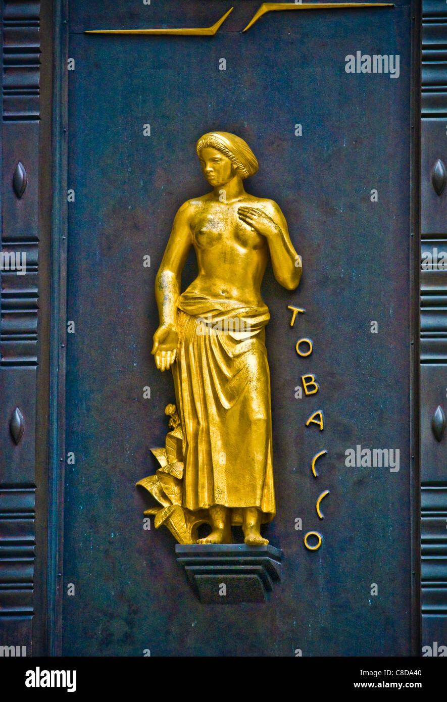 Gilded allegorical figures on large bronze panel representing ...