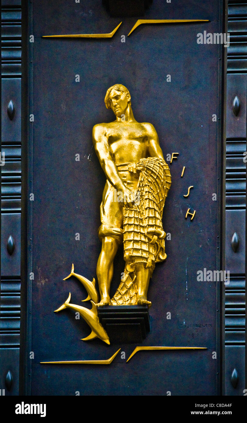 Gilded allegorical figures on large bronze panel representing ...