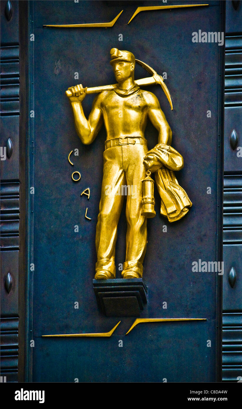 Gilded allegorical figures on large bronze panel representing ...