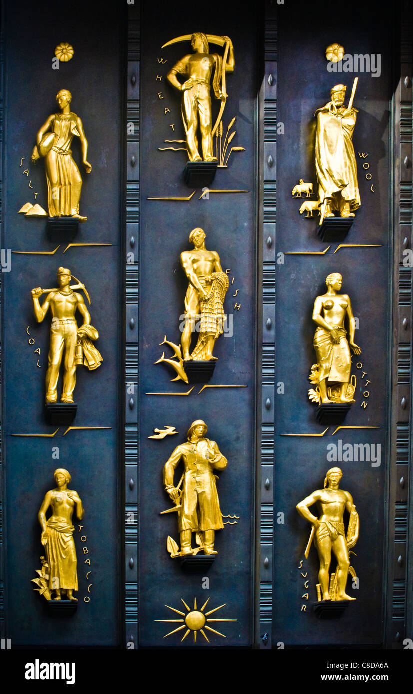 Gilded allegorical figures on large bronze panel representing ...