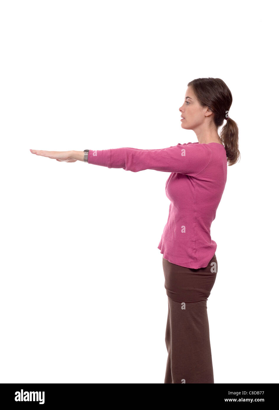 Caucasian woman stretching arms against a white background Stock Photo ...