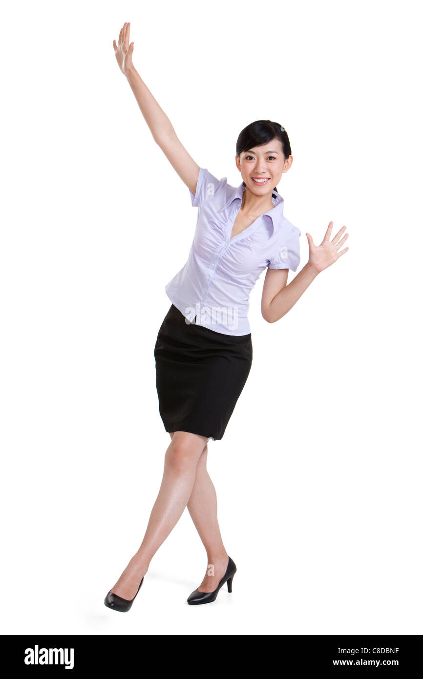 Woman waving hand standing Cut Out Stock Images & Pictures - Alamy