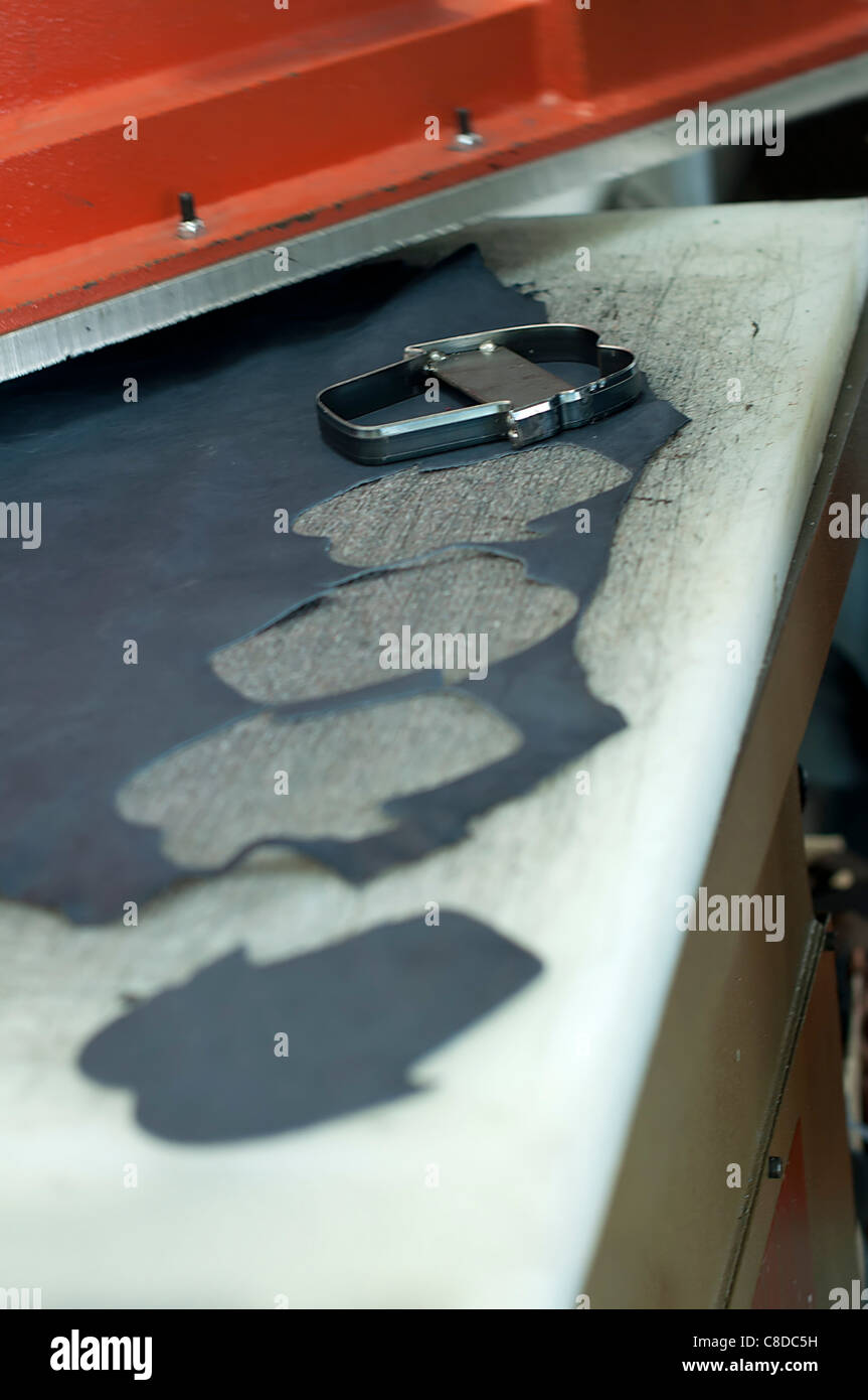 Cutting leather for shoes making Stock Photo - Alamy