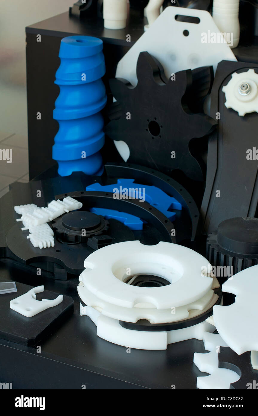 Plastic machine parts. Vertical imagel Stock Photo - Alamy