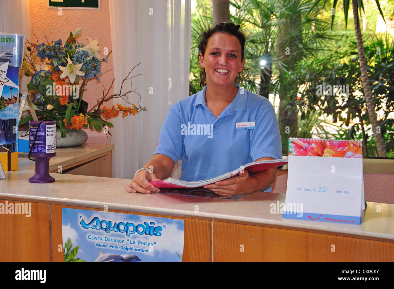 Smiling Thomson rep at hotel desk, Salou, Costa Dorada (Daurada ...