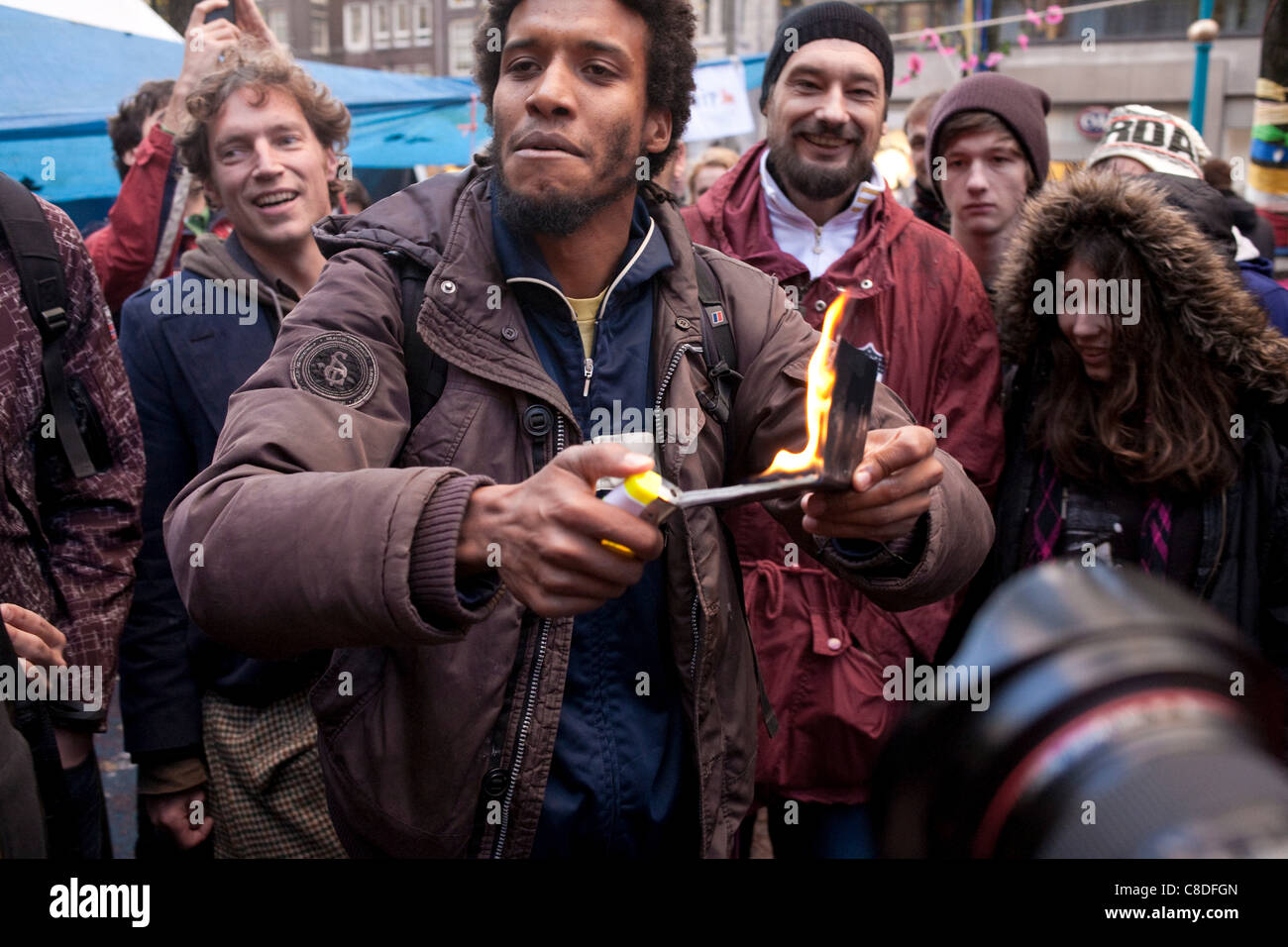 Protestor burning passport hi-res stock photography and images - Alamy