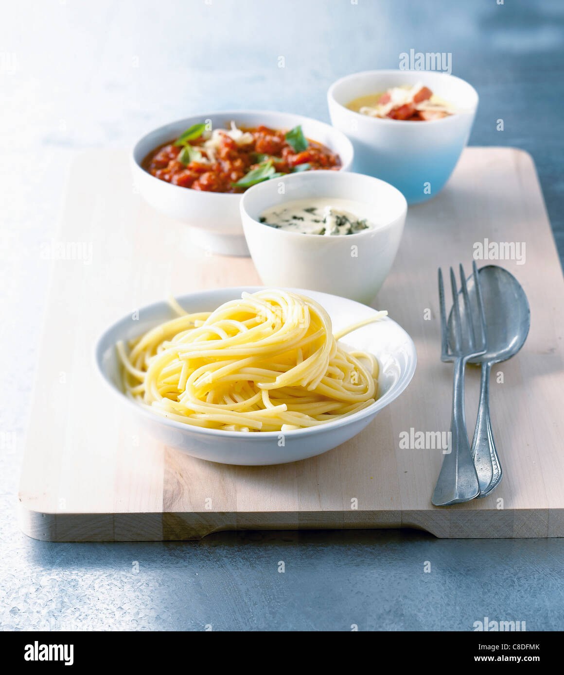 Spaghetti with three sauces Stock Photo - Alamy