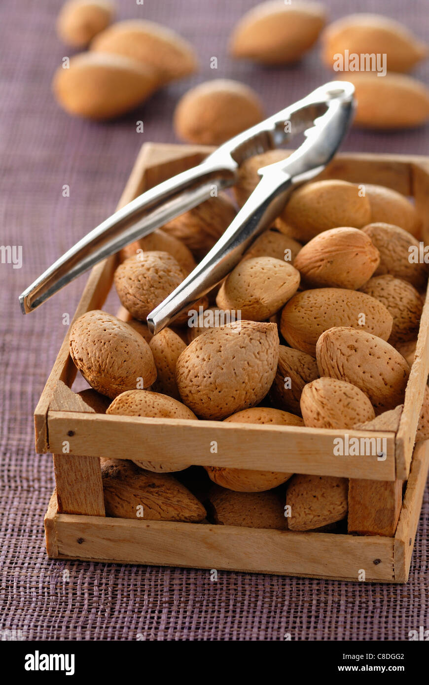 Small crate of almonds Stock Photo - Alamy