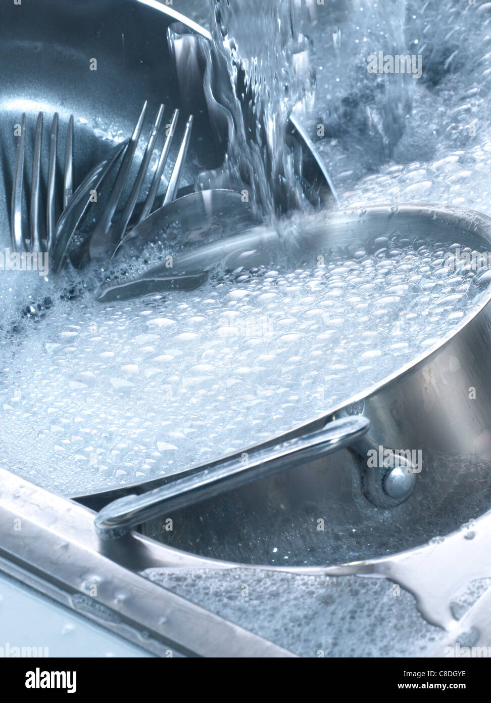 Dishes washing in the sink Stock Photo - Alamy