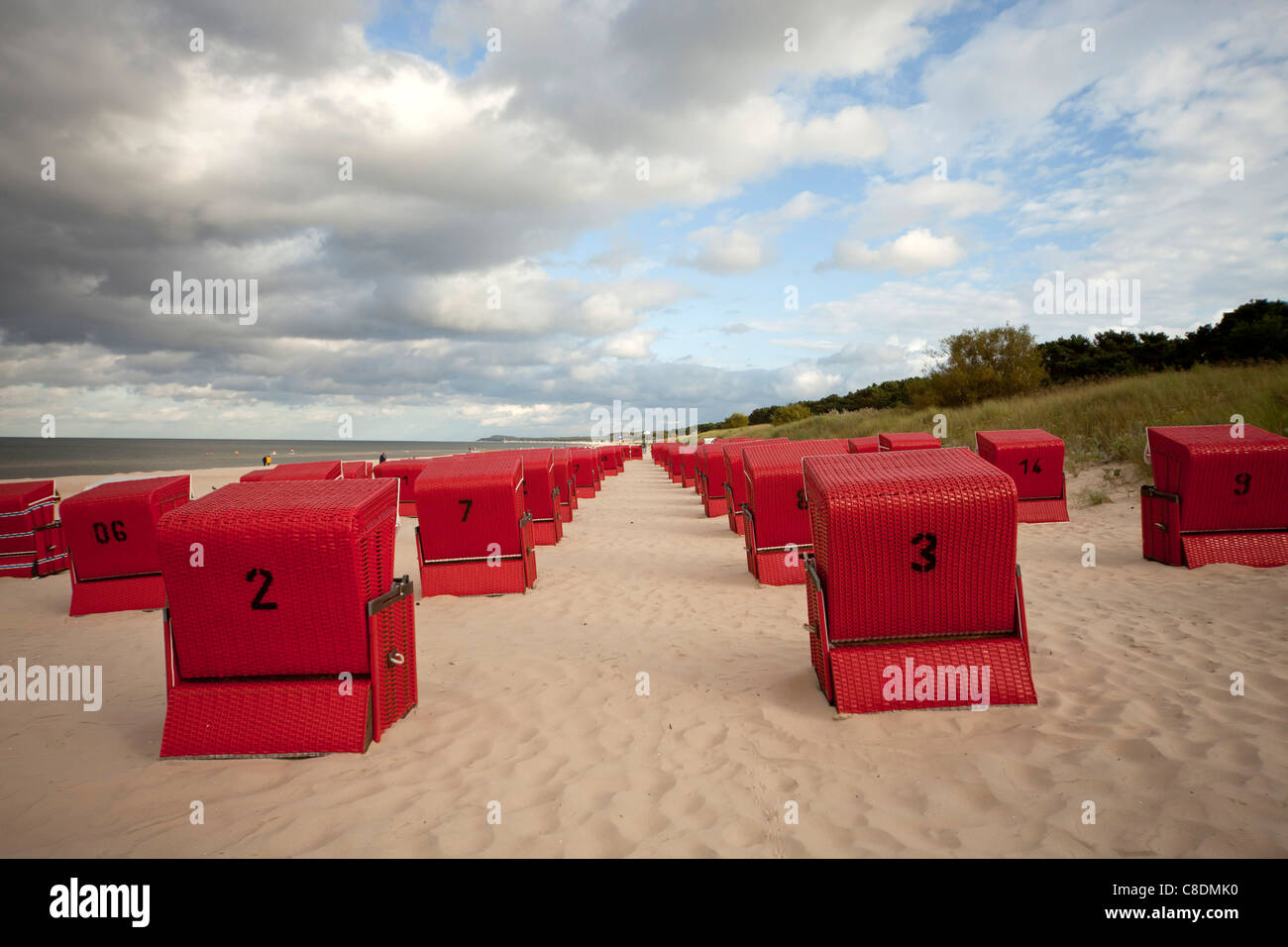 red Beach chairs " Strandkorb " and the baltic beach of the seaside ...