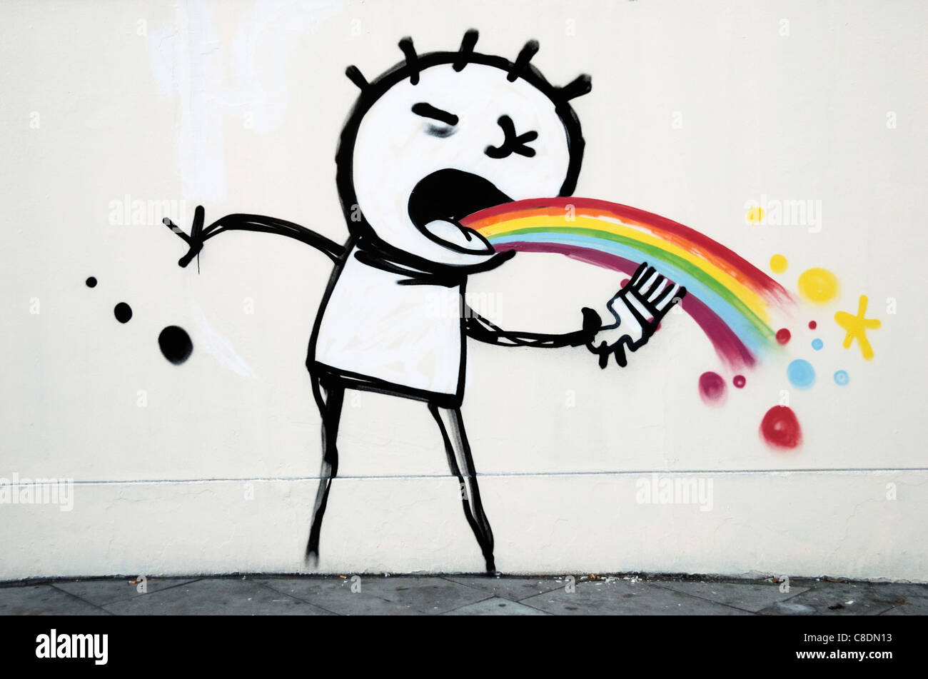 Mural drawing of a woman spewing colours Stock Photo - Alamy