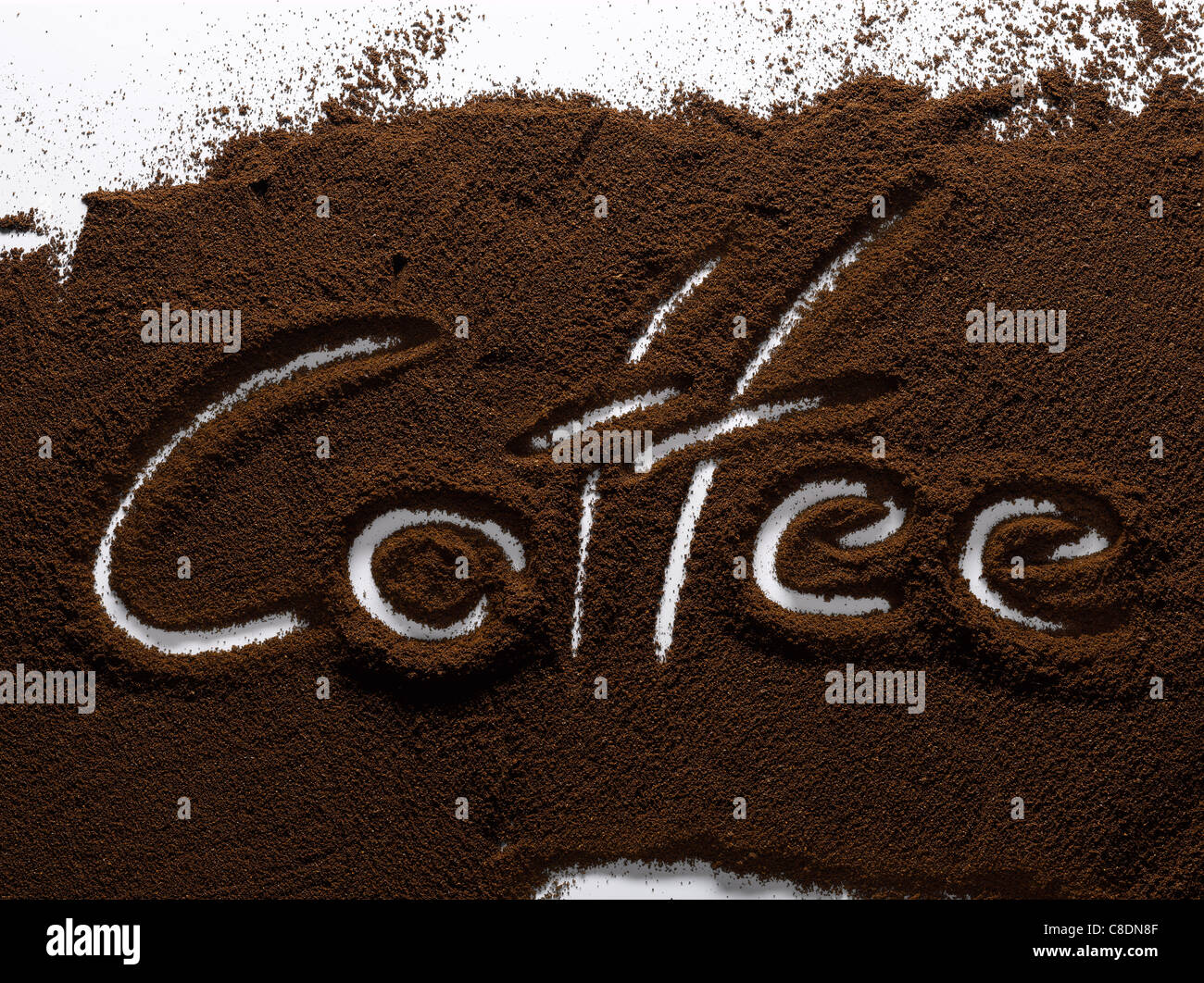 The word "coffee" written in ground coffee Stock Photo - Alamy