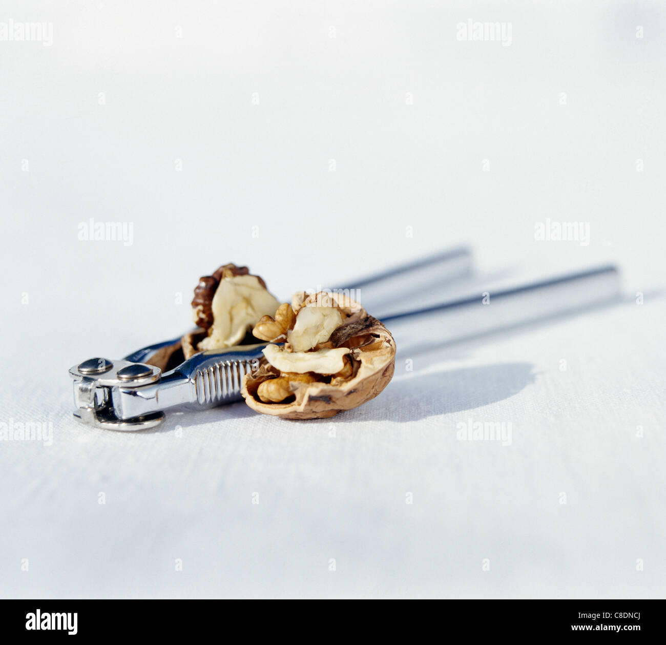 Walnut and nutcracker Stock Photo - Alamy