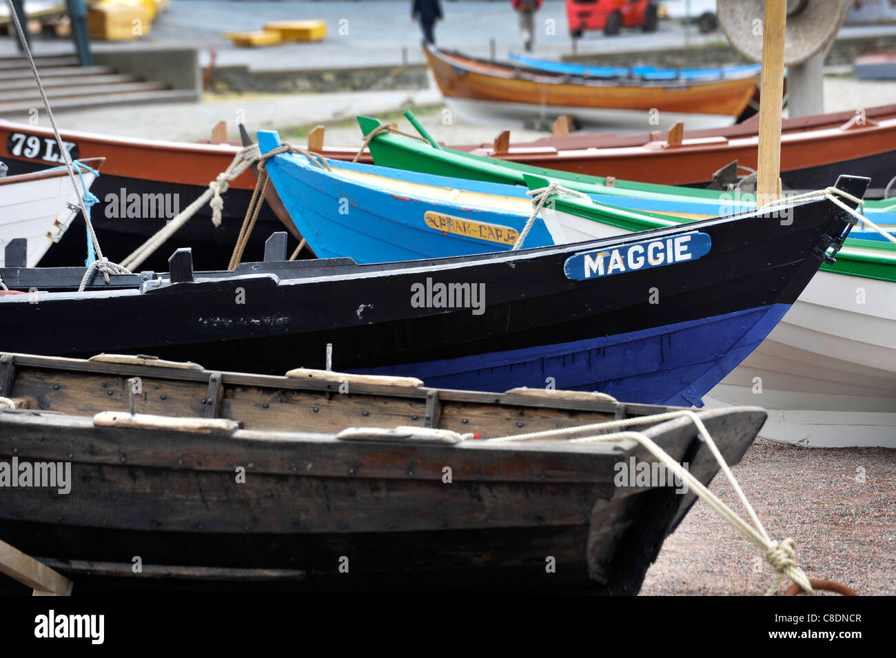 View of the hulls of small boats on Lerwick Harbour, Shetland Islands ...