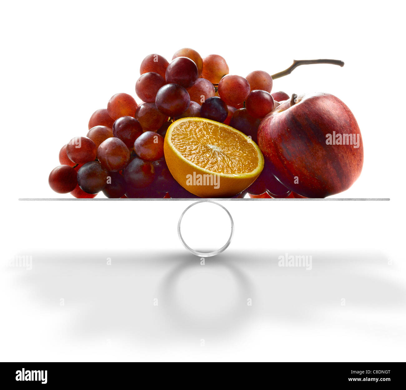 Selection of fruit on scales Stock Photo - Alamy