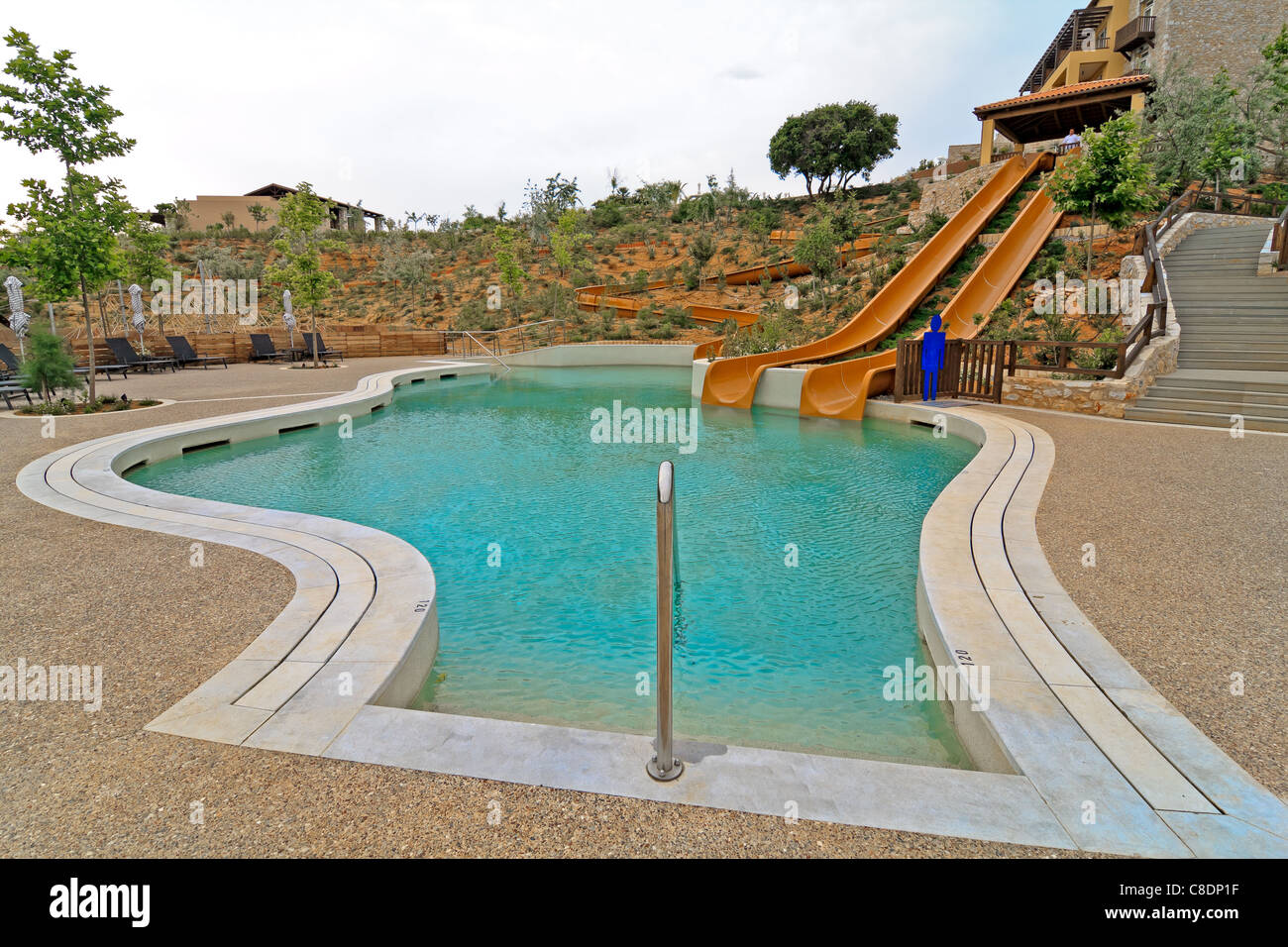 Luxury Resort Pool and chairs at hotel resort in Greece Stock Photo - Alamy