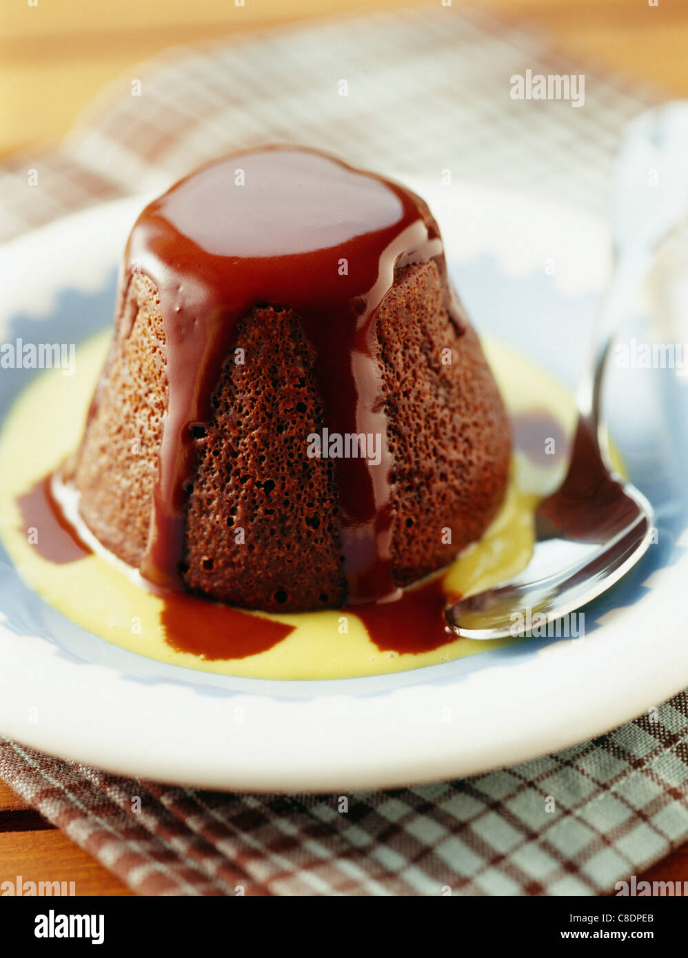 Individual dark chocolate runny pudding Stock Photo - Alamy