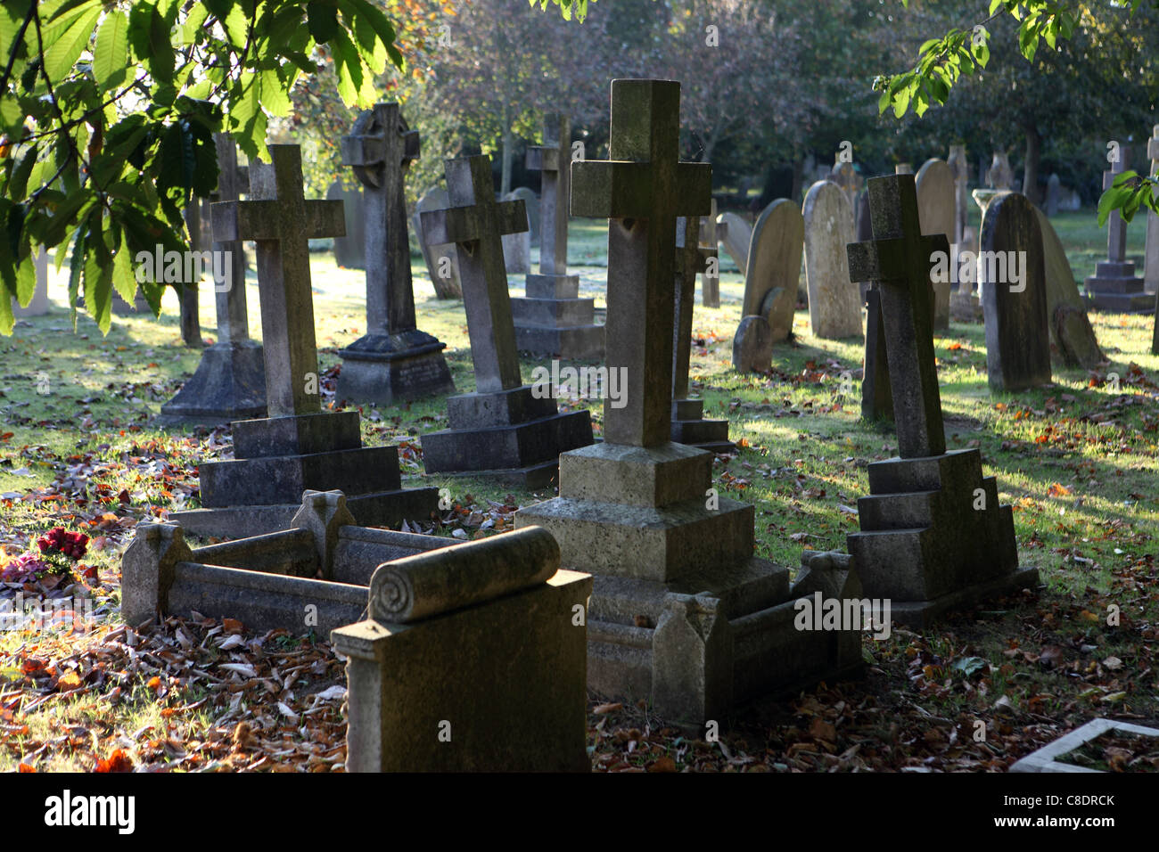 stone crosses on grave stones in English Victorian cemetery, Aldeburgh ...