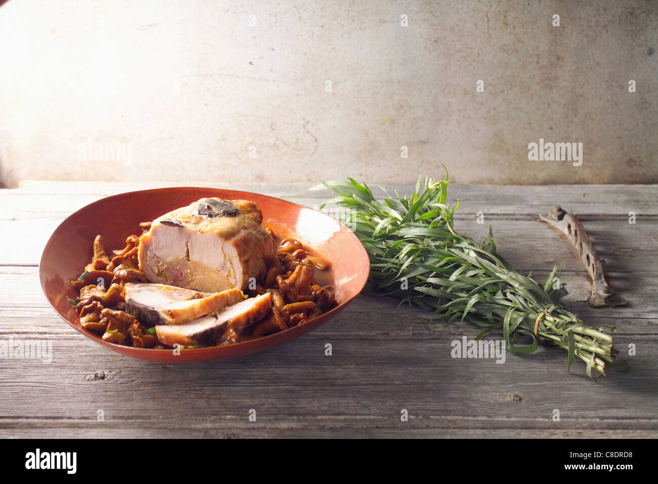 Saddle of rabbit with Foie gras and small pan-fried chanterelles Stock ...