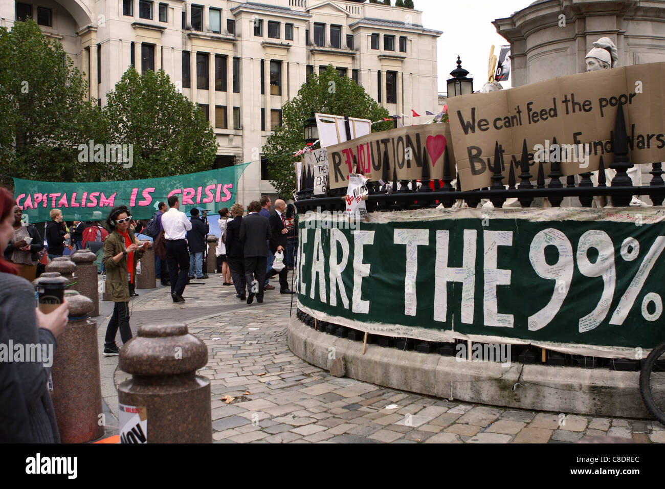 Banners and slogans at the anti-capitalist protest outside St Paul's ...
