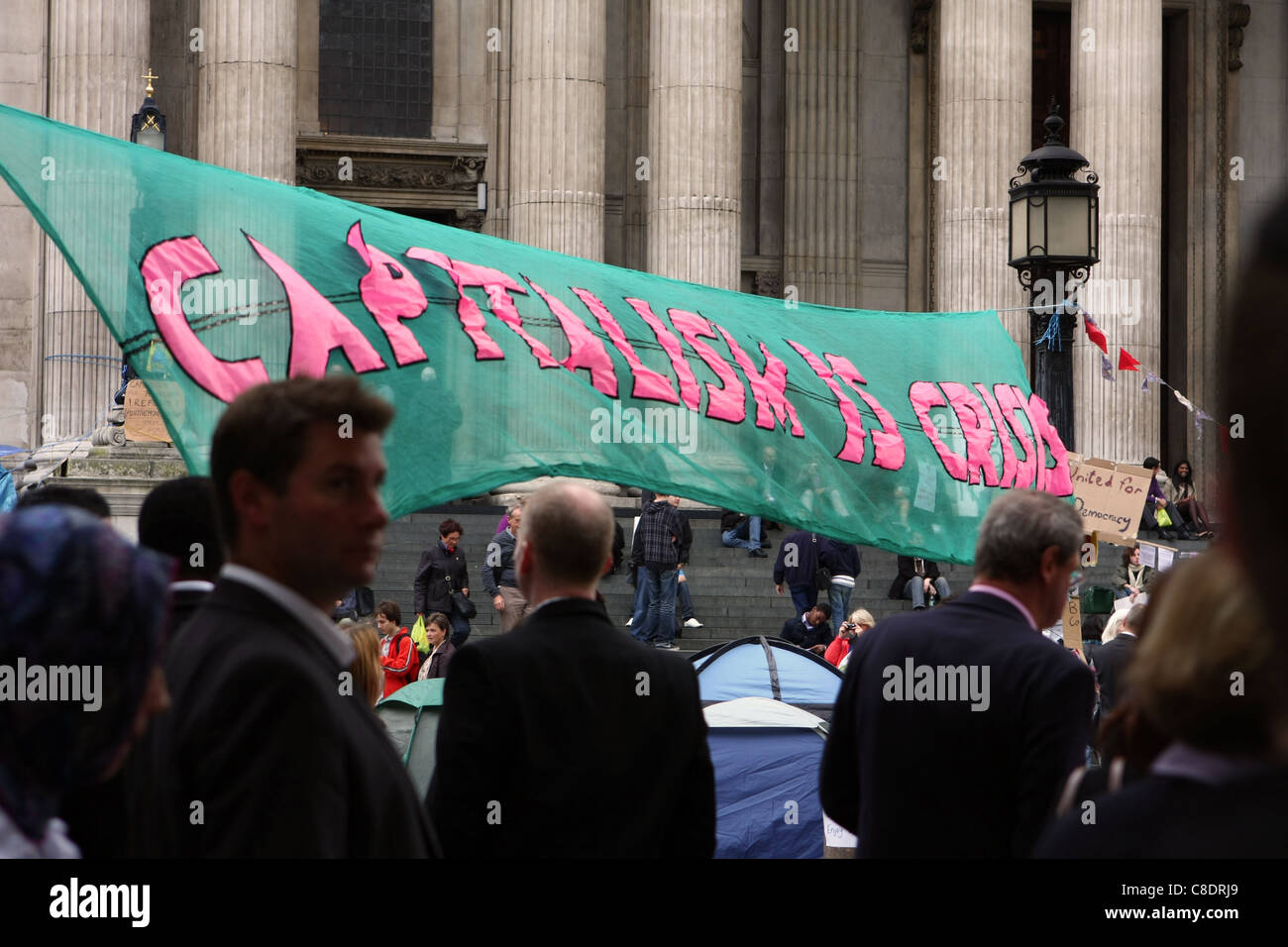 Businessmen at the anti-capitalist protest outside St Paul's Cathedral ...