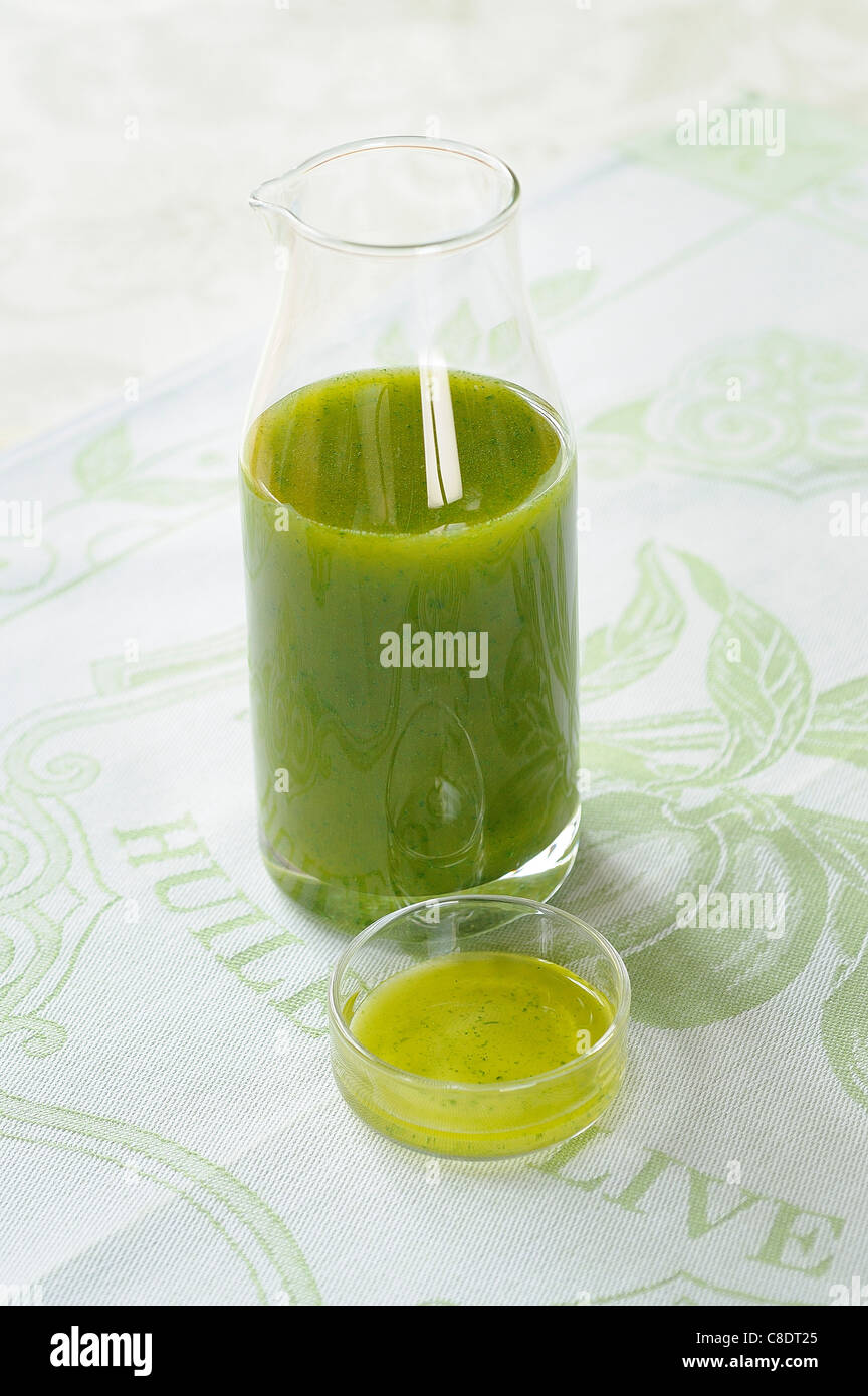 Green herb oil Stock Photo - Alamy